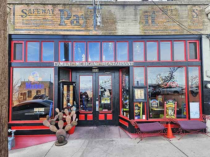 Those bright red window frames aren't just decoration; they're a beacon calling you up the mountain to Mexican food paradise.