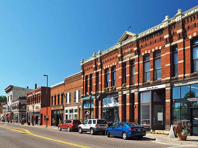 Historic Main Street stretches before you like a perfectly preserved postcard from Minnesota's golden age of commerce and craftsmanship.