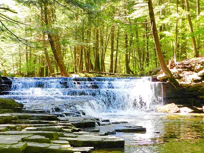 Nature's staircase leads to liquid poetry, where water and stone have been dancing together for millennia.