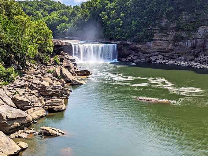 Mother Nature showing off with 125 feet of pure waterfall magic and layered rock that looks straight out of a geology textbook.
