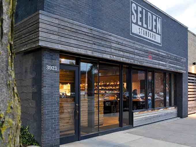 That storefront isn't just inviting you in, it's practically begging you to experience Detroit's culinary renaissance firsthand.
