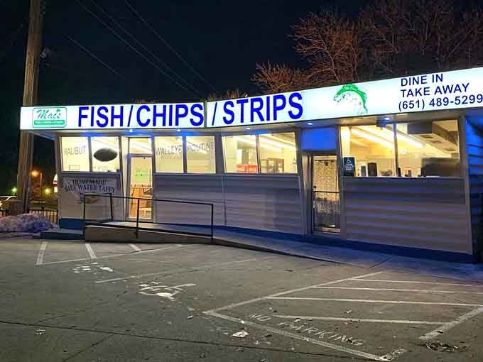 That glowing blue-trimmed exterior might be simple, but behind those windows lies some of the Midwest's most exceptional fried walleye.