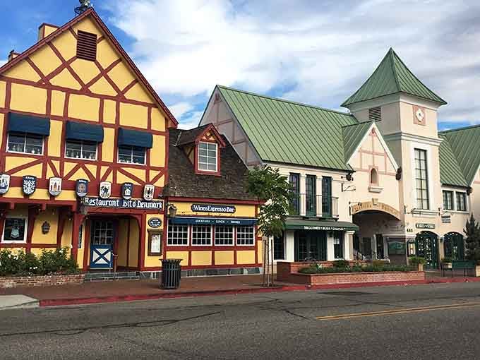 Colorful half-timbered buildings line the streets, showcasing authentic Danish design that makes you forget you're still in California.
