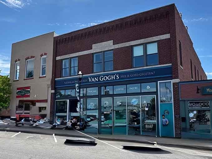 That bright blue facade isn't just pretty, it's practically waving you inside for Dutch deliciousness.