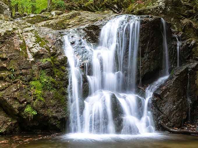 Water tumbles over moss-draped rocks like nature's own fountain show, proving Maryland has serious scenic game.