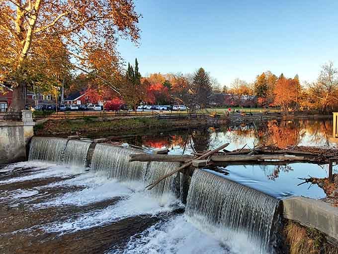 The Chagrin Falls waterfall in autumn is nature showing off, and honestly, we're here for every golden moment of it.