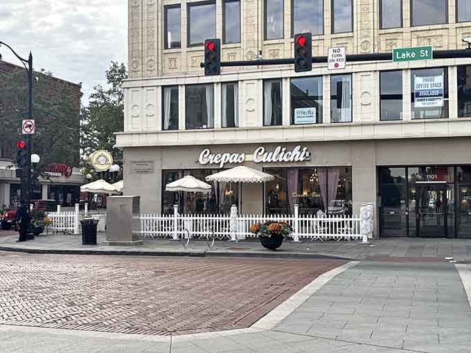 That cursive signage against classic architecture is calling your name louder than your alarm clock on Sunday morning.