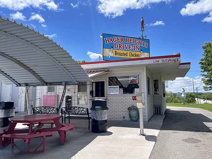 That classic drive-in architecture hits different when you know legendary broasted chicken awaits inside those walls.