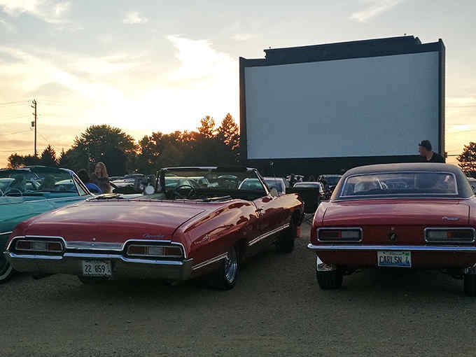 Classic cars at a drive-in theater? Someone's living their best American Graffiti fantasy, and we're here for it.