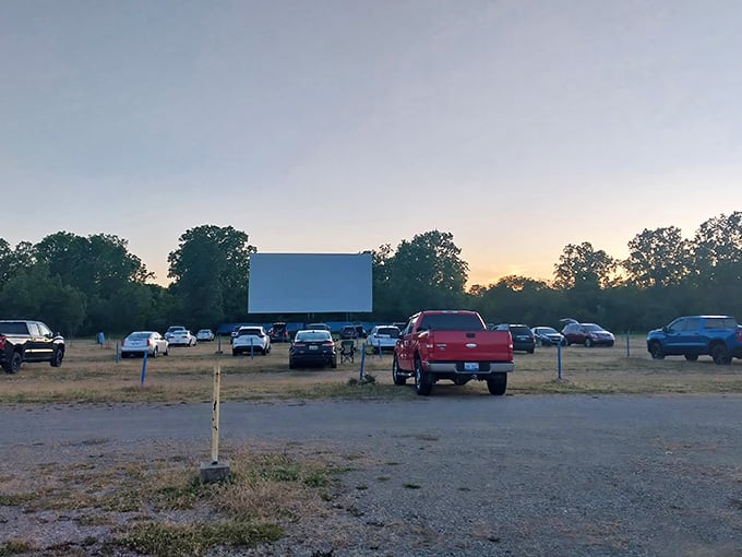 That iconic screen rising against the twilight sky is your portal to cinematic magic, Michigan style.