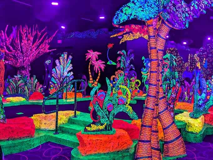Those glowing palm trees and psychedelic colors create a jungle where the only thing missing is a soundtrack.