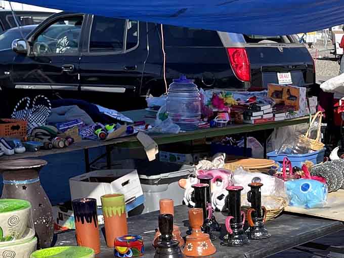Tables laden with treasures under shaded canopies, where every vendor's display tells its own story of possibility.