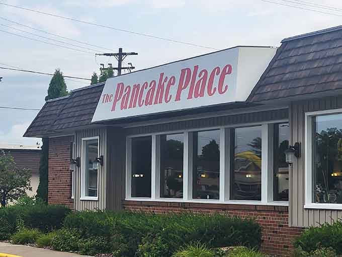 That classic brick exterior hides breakfast dreams bigger than a Packers linebacker's appetite on game day.