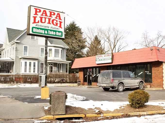 That classic red and green sign promises authentic Italian comfort, and the parking lot full of locals proves it delivers.