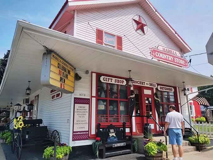 That red-trimmed white facade isn't just charming, it's basically a beacon calling you toward homemade happiness and sponge candy glory.