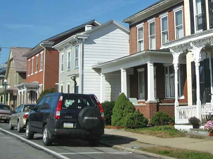 Historic homes line peaceful streets where neighbors still wave and actually mean it.