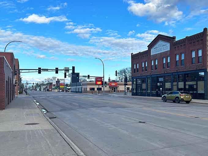 Downtown Moorhead blooms with hanging baskets and tree-lined streets where affordability meets genuine Midwestern charm beautifully.