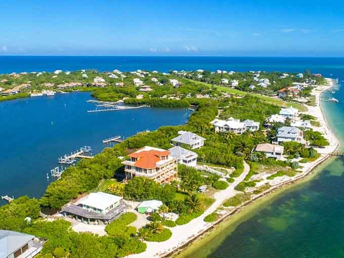 An aerial view reveals colorful beach houses scattered like confetti across this car-free paradise in the Gulf.