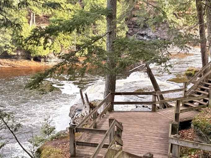 Those wooden boardwalks aren't just for show; they're your ticket to waterfall views without the mud-wrestling experience.
