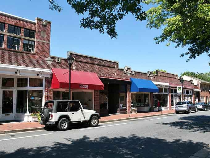 Those colorful awnings aren't just pretty, they're invitations to slow down and see what treasures wait inside.