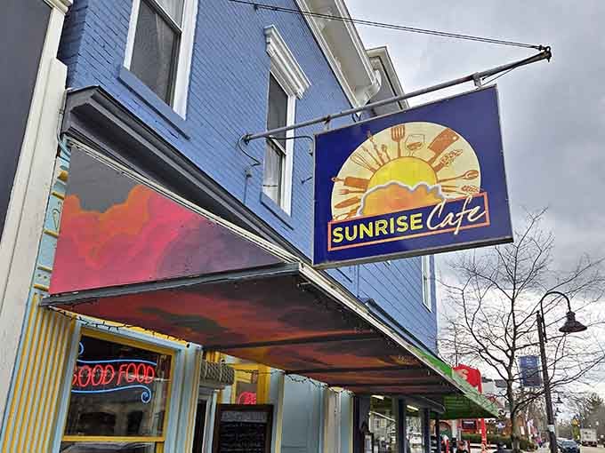 That cheerful awning isn't just decoration, it's a promise that good things await inside Sunrise Cafe.