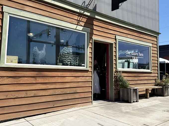 The Dizzy Hen's warm wood exterior welcomes you like an old friend with excellent taste in breakfast spots.