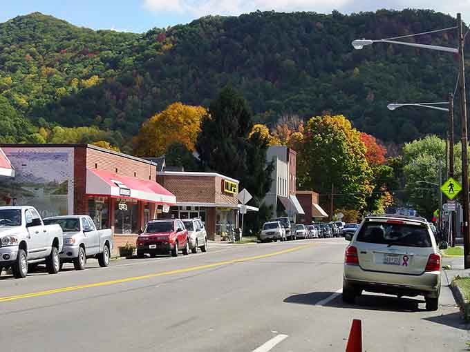 Mountains cradling Main Street like nature's own welcome committee, with fall colors showing off shamelessly.