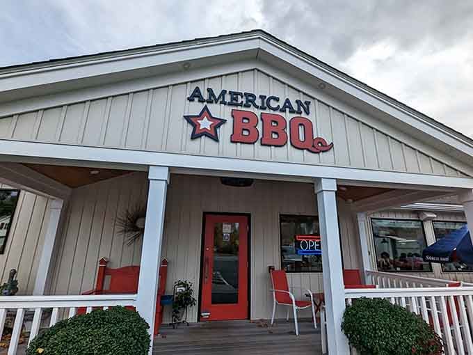 That welcoming front porch with red accents promises authentic American BBQ hiding behind those doors in Rowley.