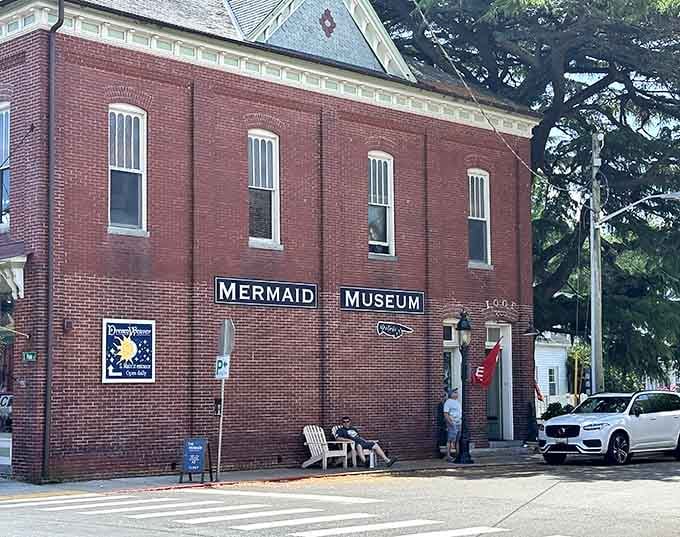 That historic brick building isn't hiding municipal records anymore, it's harboring mermaids and we're totally here for it.