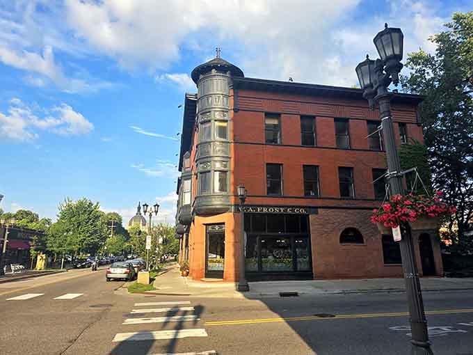 That cylindrical turret and burnt orange brick scream 1880s elegance louder than your grandmother's china cabinet ever could.