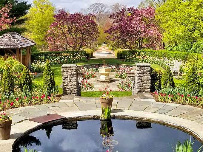 Spring blooms frame stone terraces and reflecting pools like nature's own version of Versailles, minus the French attitude.