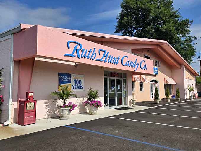 A candy shop celebrating a century of sweetness deserves flowers at the entrance and your immediate attention inside.