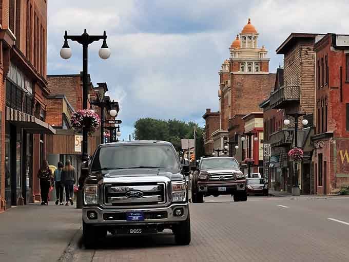 Historic downtown Houghton stretches along the waterfront like a perfectly preserved time capsule with actual parking spaces.