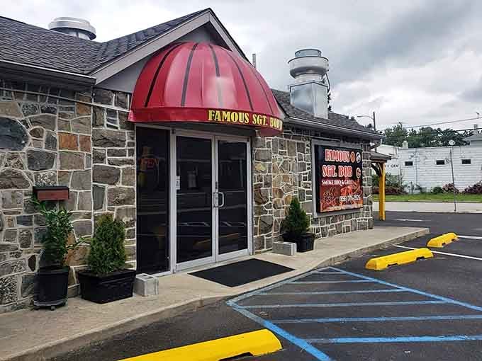 That distinctive red awning and stone facade might be small, but it's become a beacon for barbecue lovers statewide.
