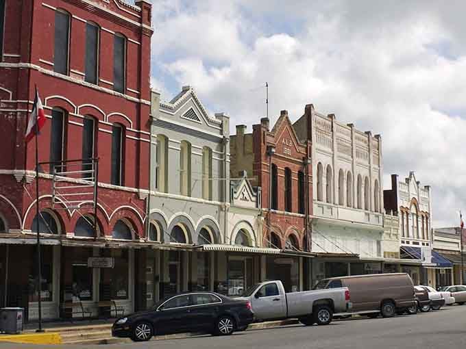 Historic storefronts line the square like proud sentinels guarding Central Texas's most delicious secret for over a century.
