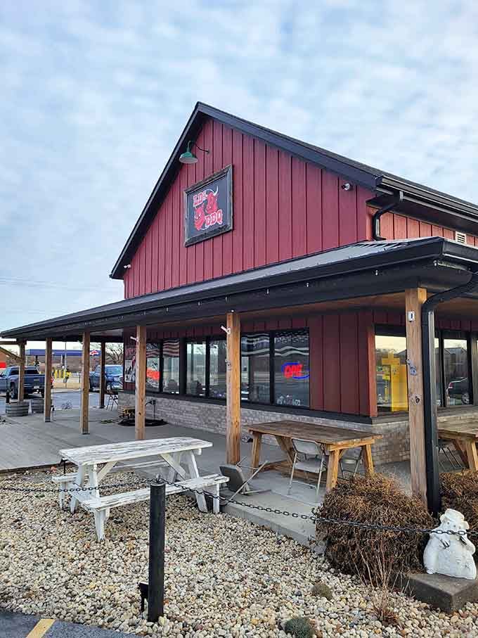 That red barn exterior isn't just for show; it's a beacon calling barbecue lovers from miles around.