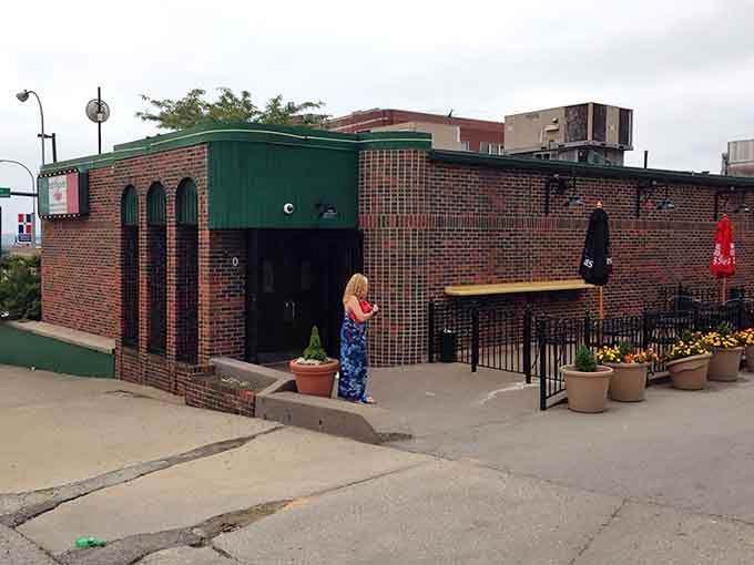 That unassuming brick exterior hides culinary treasures that have kept Kansas City coming back for generations.