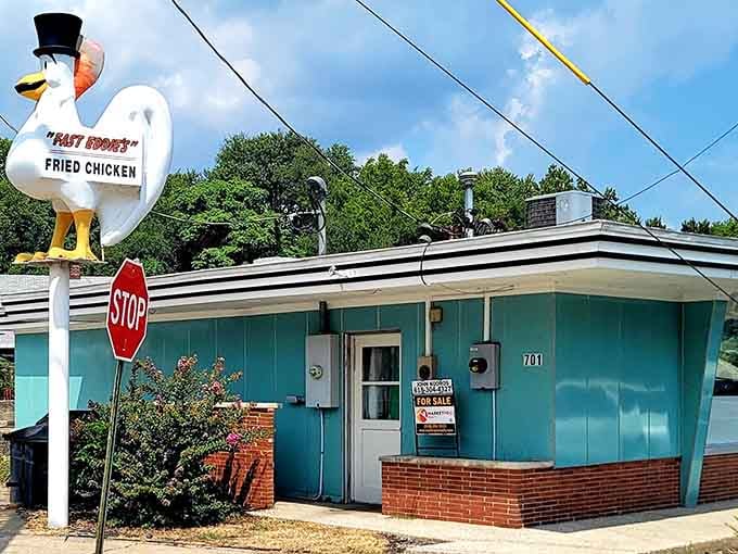 That giant chicken wearing a top hat isn't just whimsical, it's a beacon calling you to fried chicken paradise.