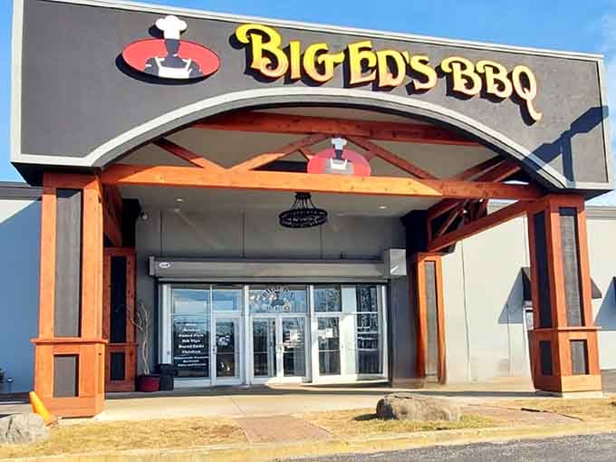 That welcoming wooden archway and cheerful pig logo promise serious barbecue awaits inside this Waukegan treasure.