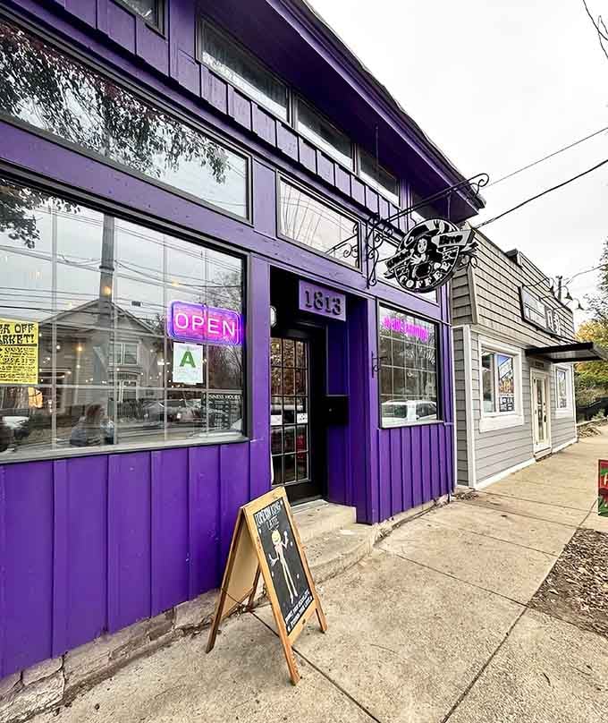 That purple facade isn't whispering for attention, it's demanding it with the confidence of a perfectly pulled espresso shot.
