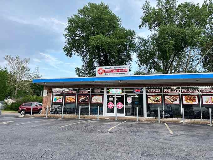 That unassuming strip mall exterior is hiding some serious breakfast magic behind those windows and doors.