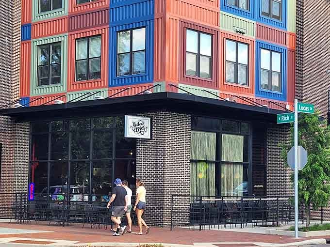 The colorful building above practically screams "fun happens here," and those outdoor tables confirm it's true.