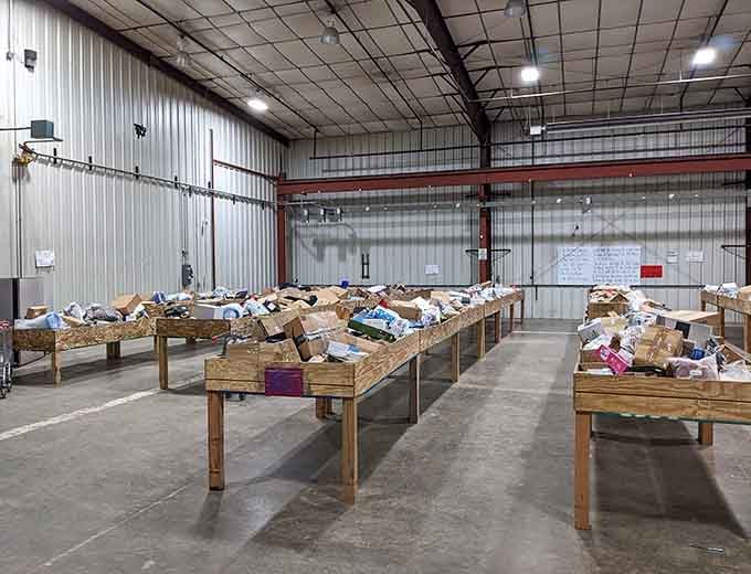 Rows of wooden bins stretch like a treasure map, each one promising discoveries that'll make your heart skip.
