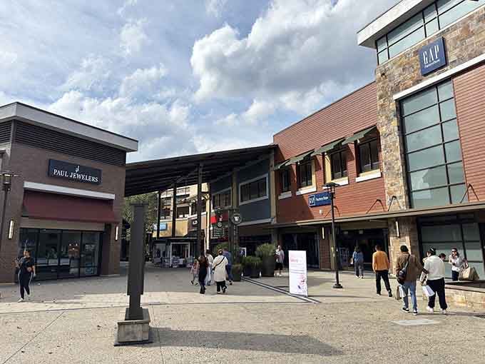 Modern architecture meets retail therapy under those dramatic Maryland clouds, where shopping feels less like a chore and more like an adventure.