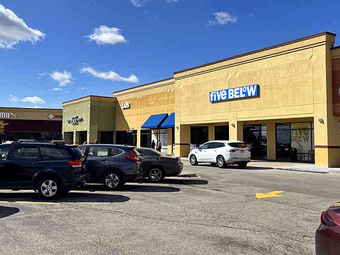 The outdoor layout means you can actually see the sky while shopping, a revolutionary concept in outlet mall design.