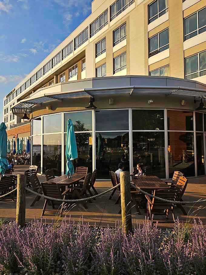 Modern glass walls meet lakeside charm where Pennsylvania's waterfront dining dreams come deliciously true every single day.