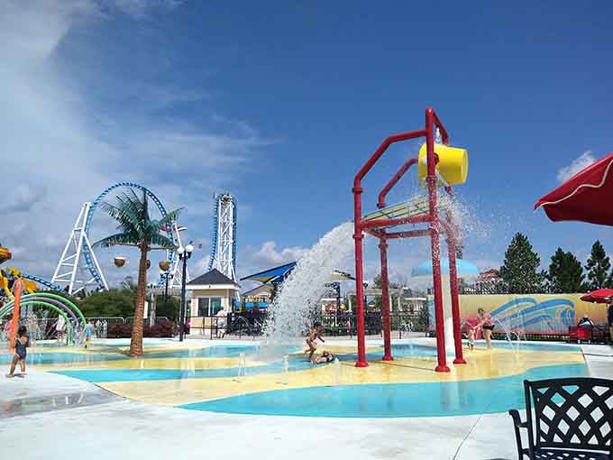 Nothing says "summer fun" quite like a splash zone where kids can pretend they're controlling the weather with giant buckets.