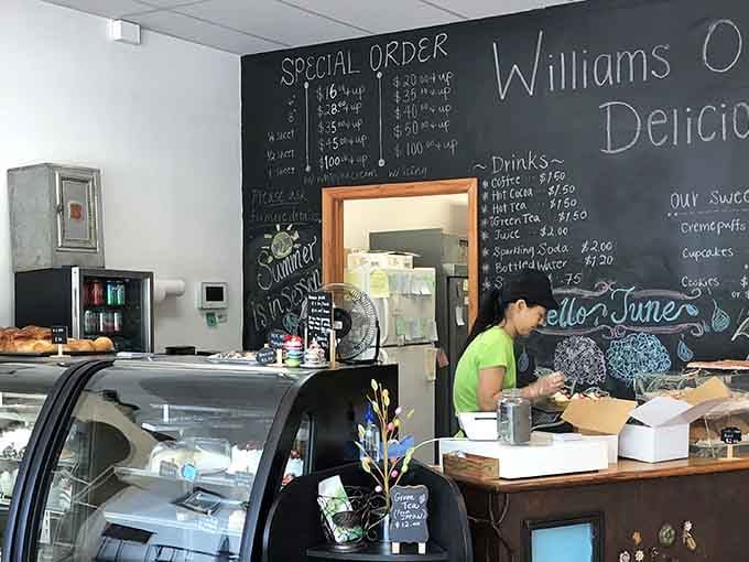 That chalkboard menu and curved display case are calling your name louder than your GPS ever could.