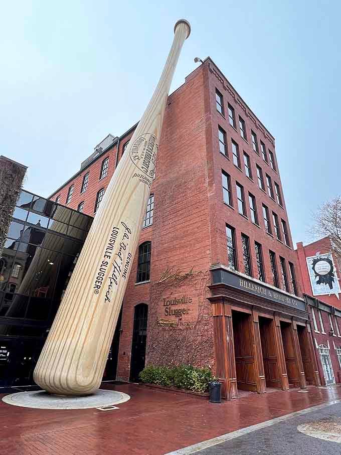 That's not a bat, THIS is a bat: 120 feet of steel painted to look like wood, leaning casually against downtown Louisville.