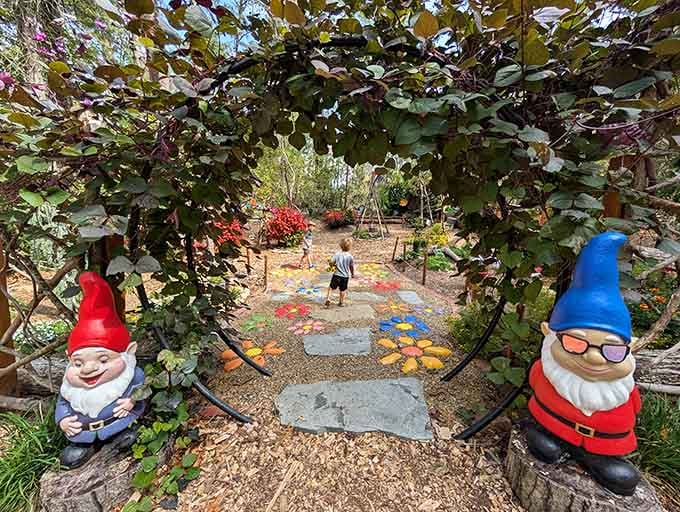 Two gnomes guarding the garden entrance like the world's tiniest, friendliest bouncers ever.